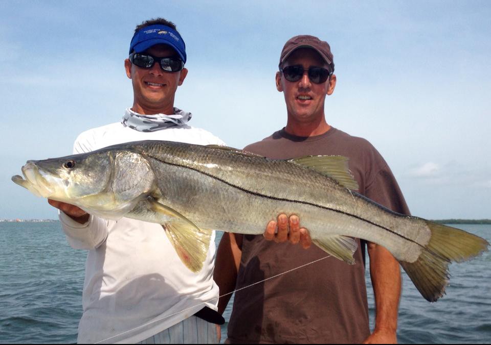 Tyler's personal best Snook caught in Tampa - Skiff Life